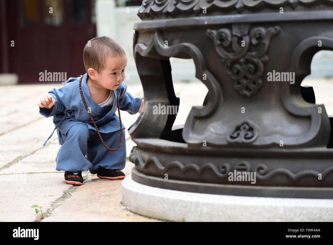 Cute little monk, children's photography Stock Photo - Alamy