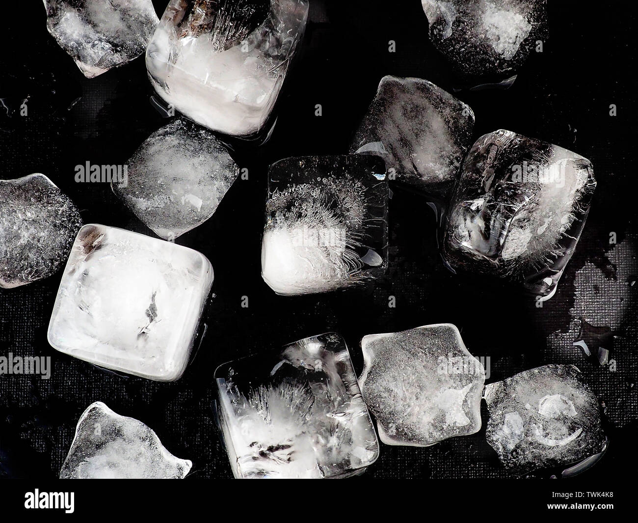 Pieces of crushed ice cubes on black background. Including clipping ...
