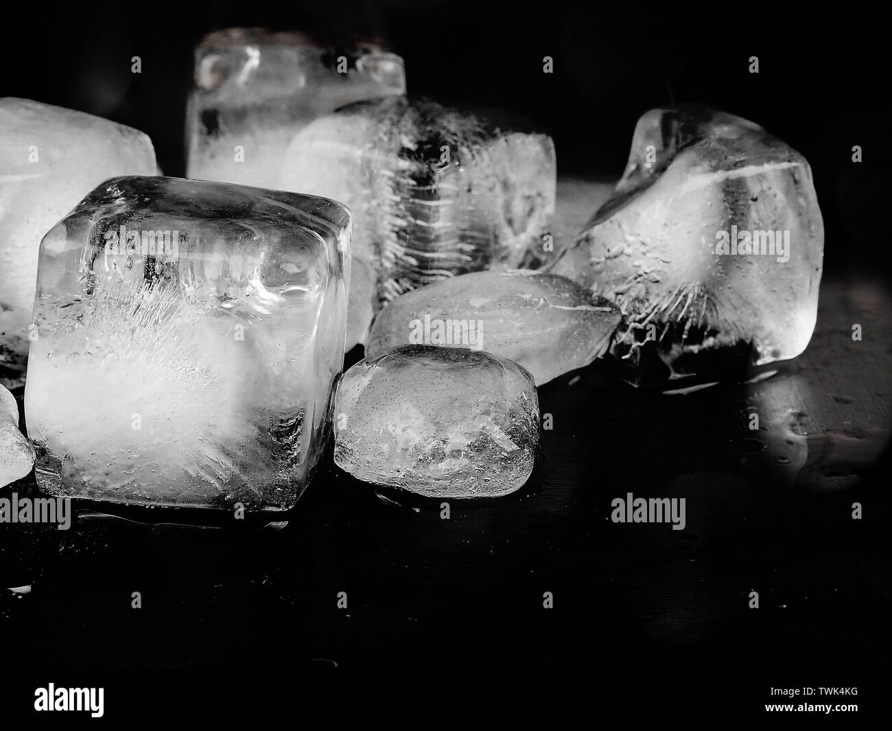 Pieces of crushed ice cubes on black background. Including clipping ...