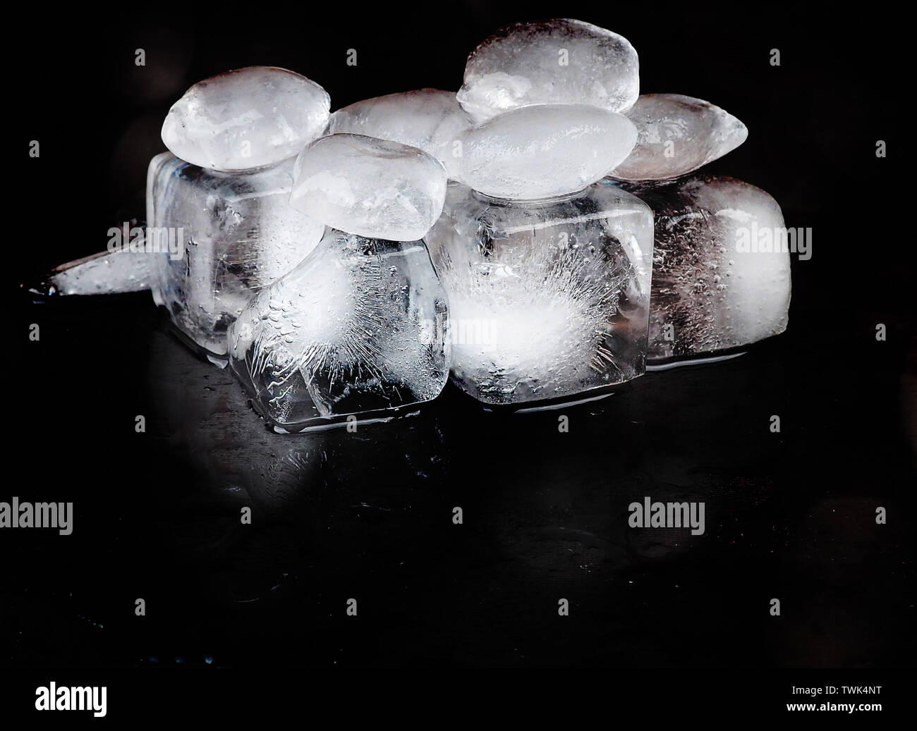 Pieces of crushed ice cubes on black background. Including clipping ...