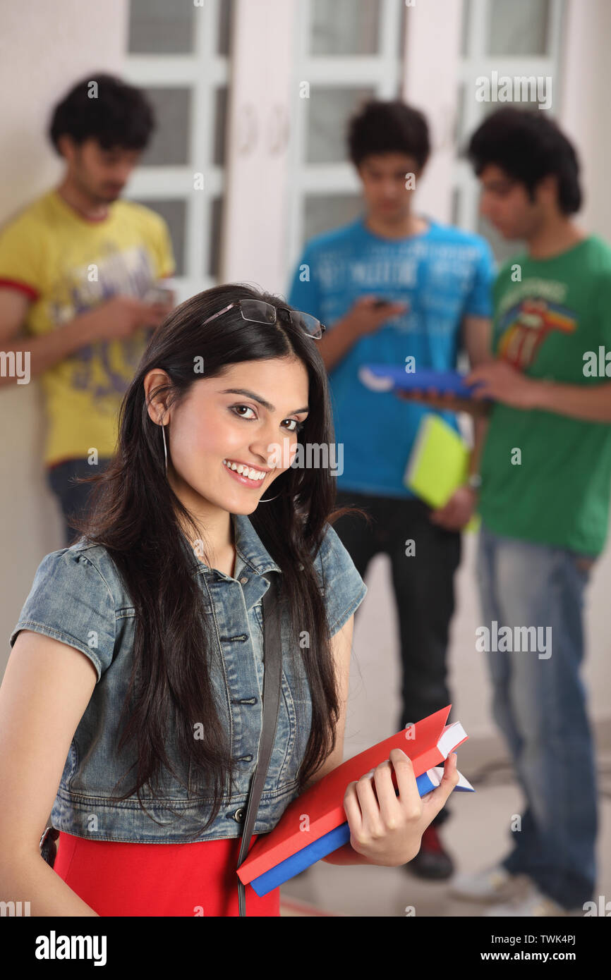 Portrait of a college student smiling Stock Photo - Alamy