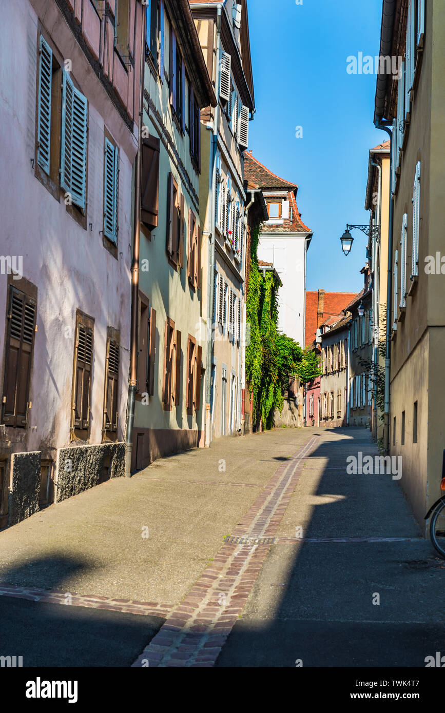 Narrow Street with colorful traditional french houses in Colmar, Alsace ...
