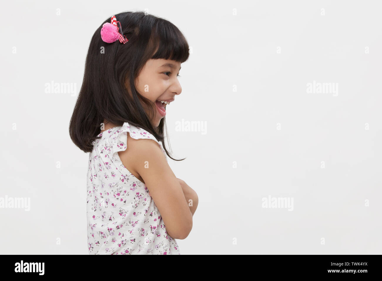 Side profile of a girl smiling Stock Photo - Alamy