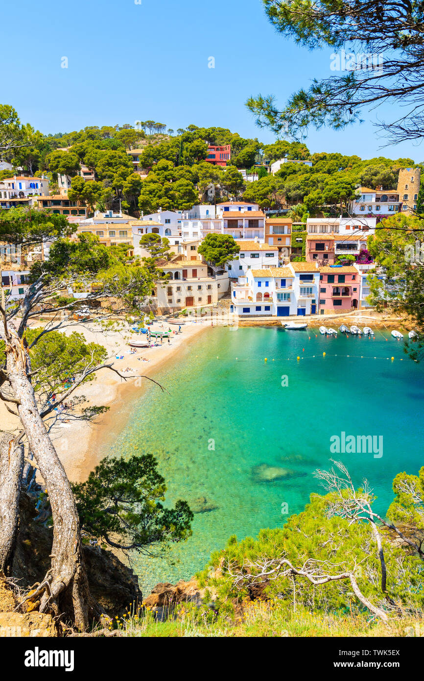 View of colorful houses in sea bay with beach in Sa Tuna coastal ...