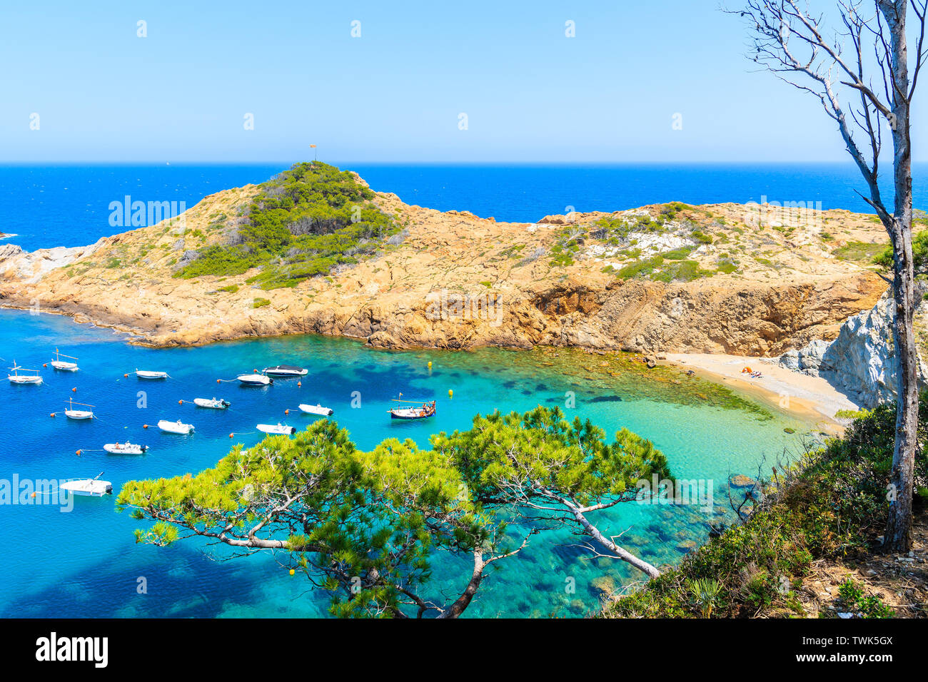 Boats in beautiful sea bay with beach near Sa Tuna village, Costa Brava ...