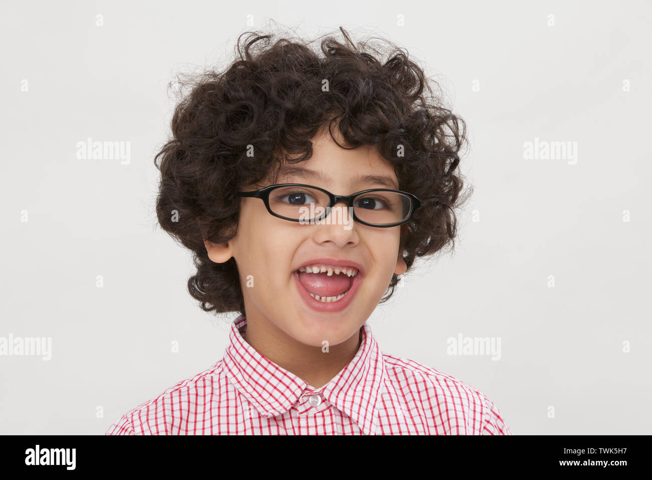 Portrait of a boy laughing Stock Photo - Alamy