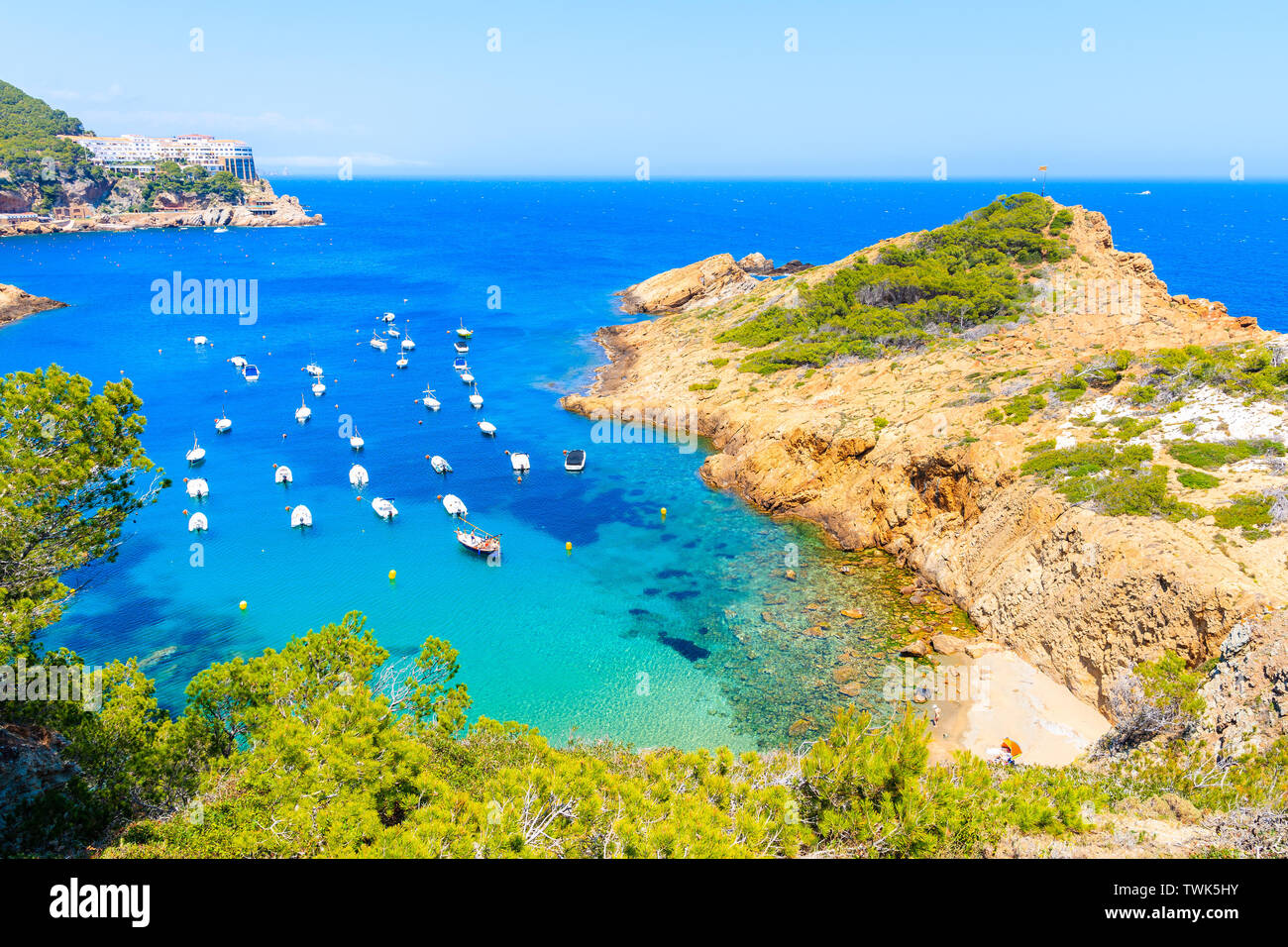 Boats in beautiful sea bay with beach near Sa Tuna village, Costa Brava ...