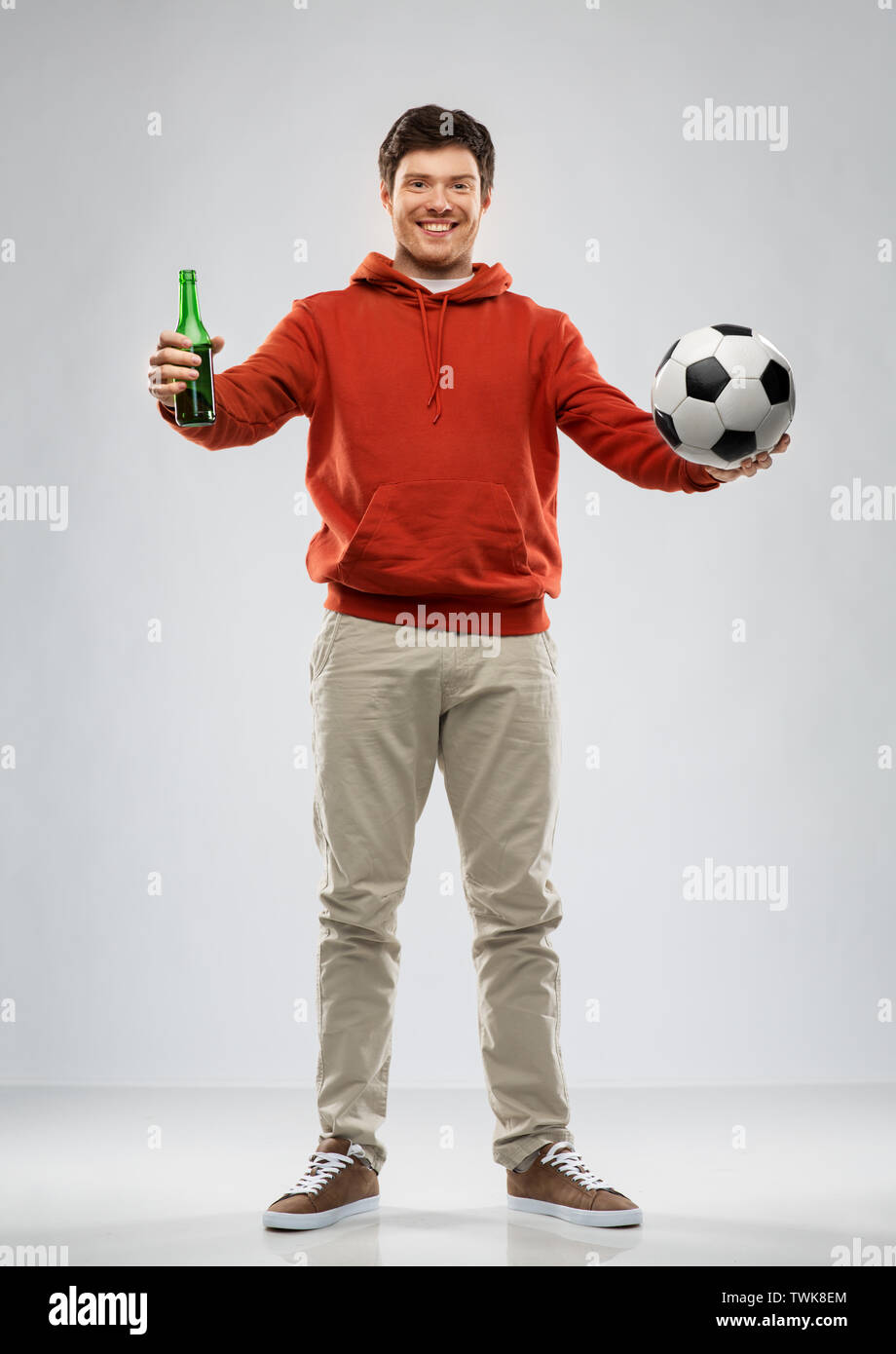 man or football fan with soccer ball and beer Stock Photo - Alamy