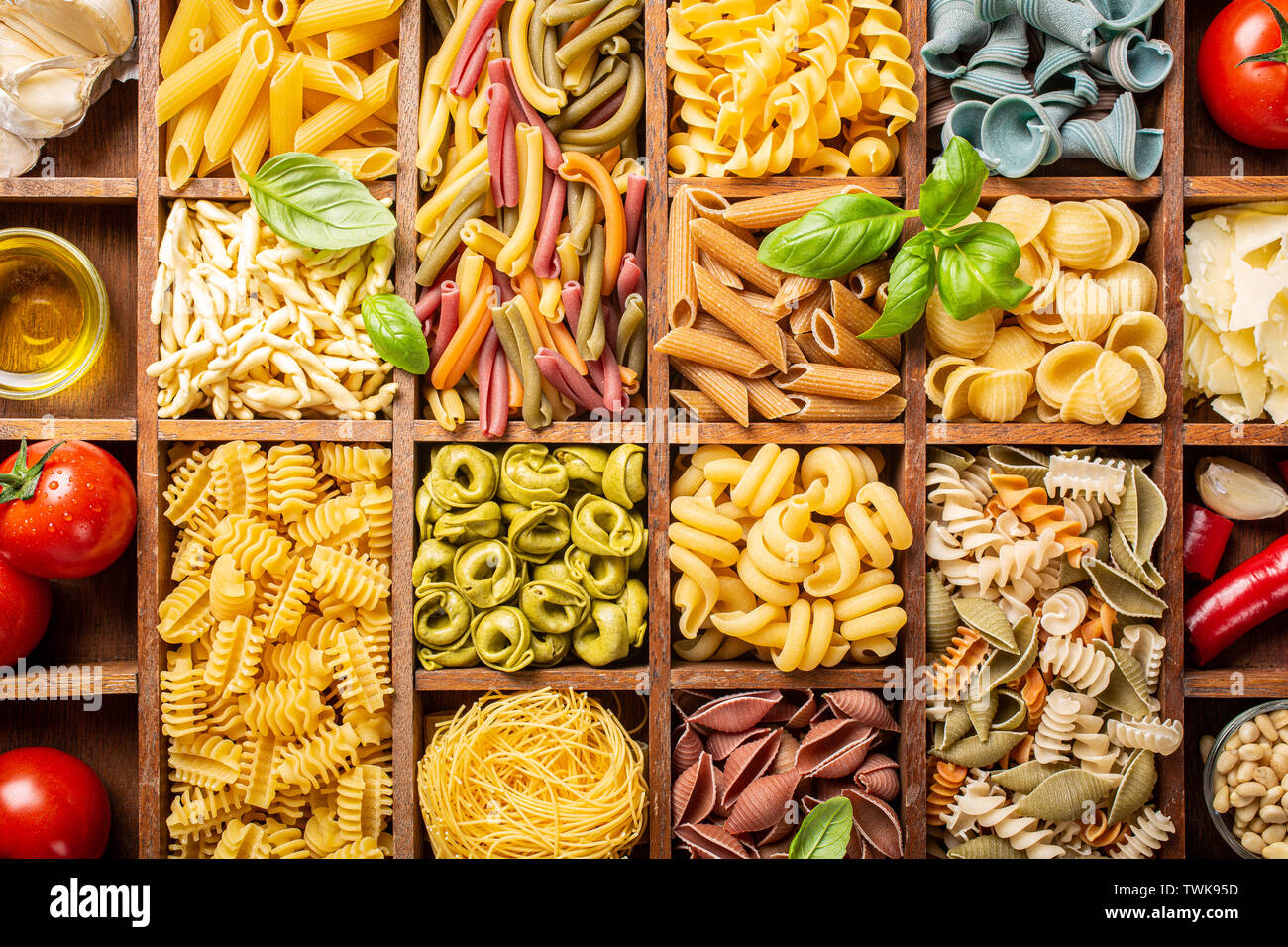 Assorted colorful italian pasta in wooden box Stock Photo - Alamy