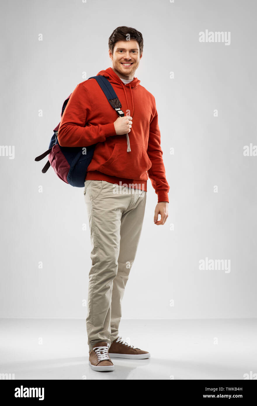 young man or student with school bag or backpack Stock Photo - Alamy