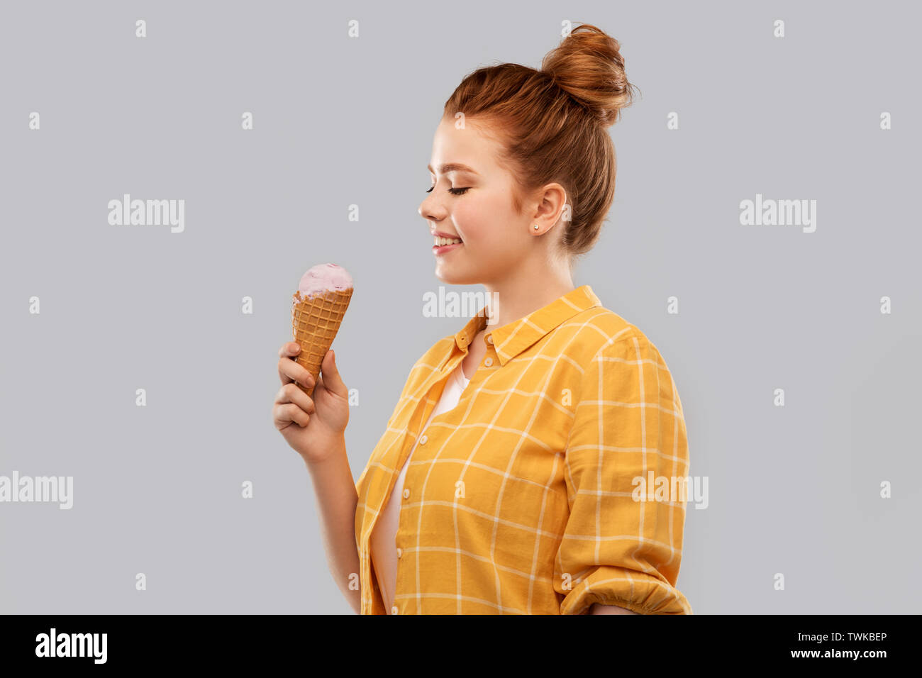 happy red haired teenage girl with ice cream cone Stock Photo - Alamy