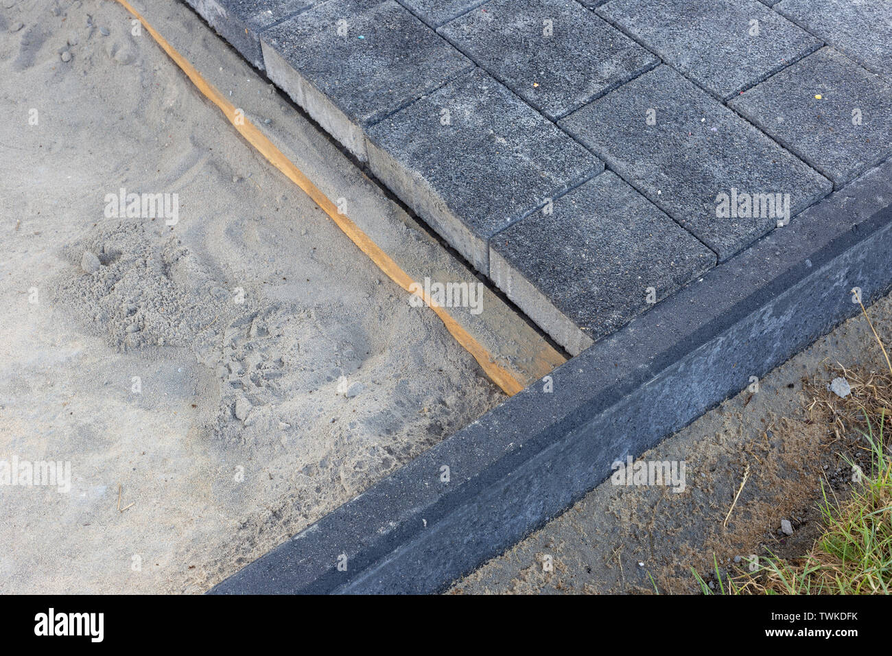 laying paving stones on the terrace Stock Photo - Alamy