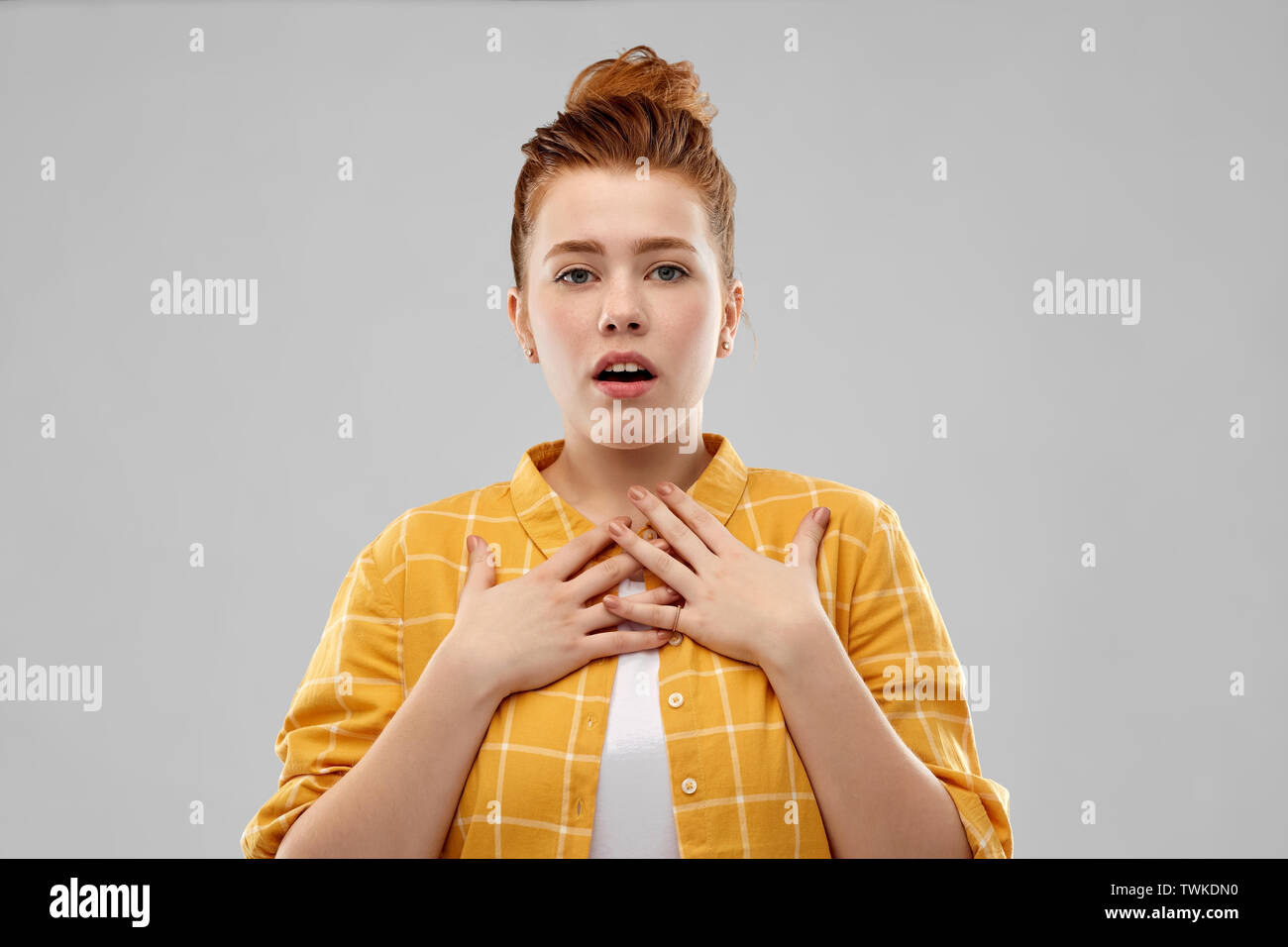 shocked or surprised red haired teenage girl Stock Photo - Alamy