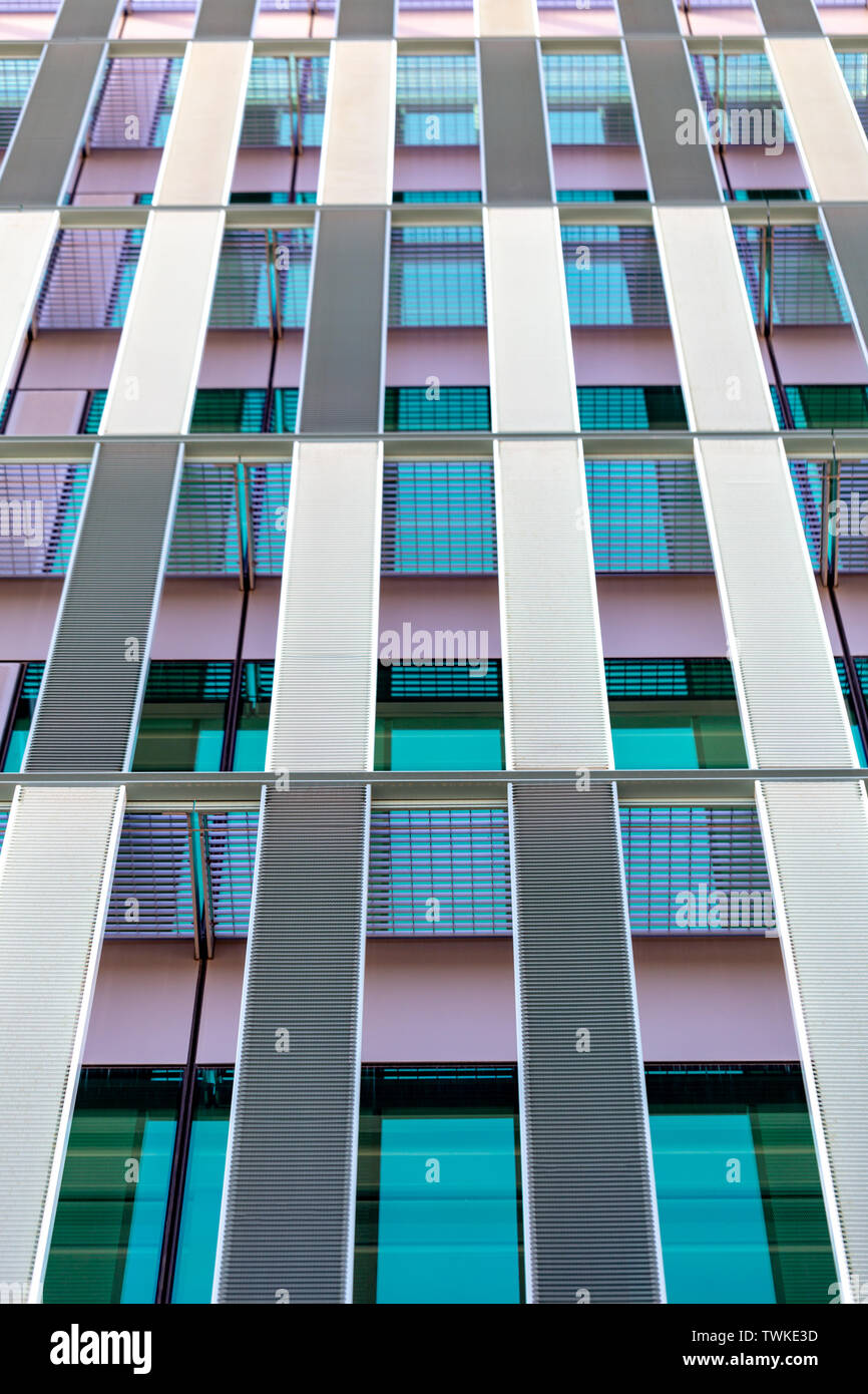 Modern building of glass and metal of unusual design Stock Photo - Alamy