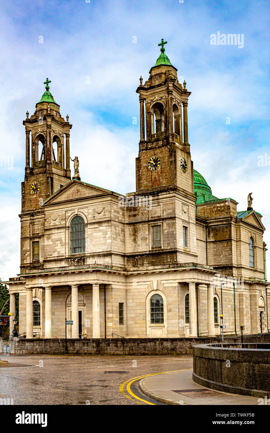 Facade of the parish church of Ss. Peter & Paul with their green domes ...