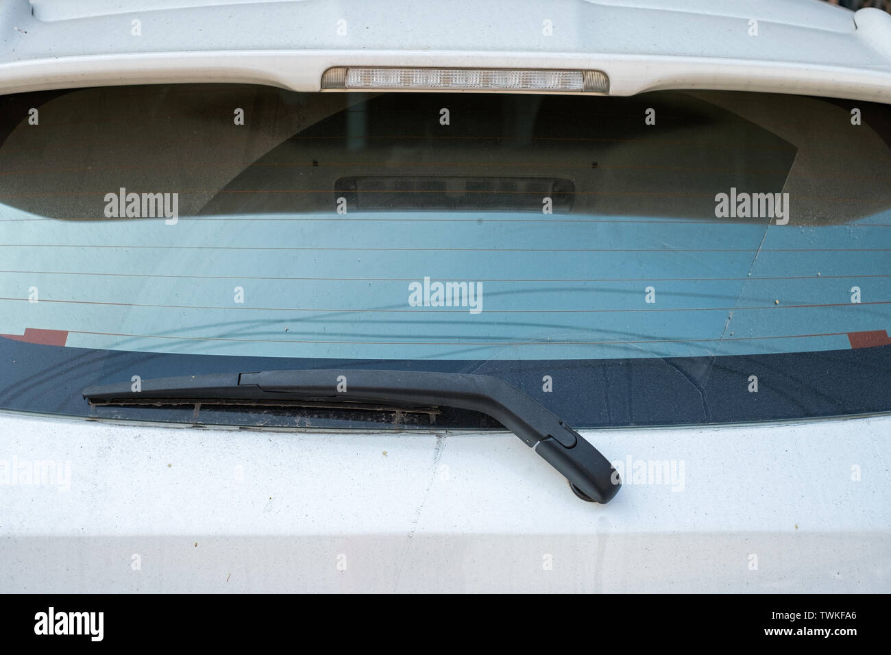 Rear dirty dust eco car with windshield wiper rubber blade Stock Photo ...