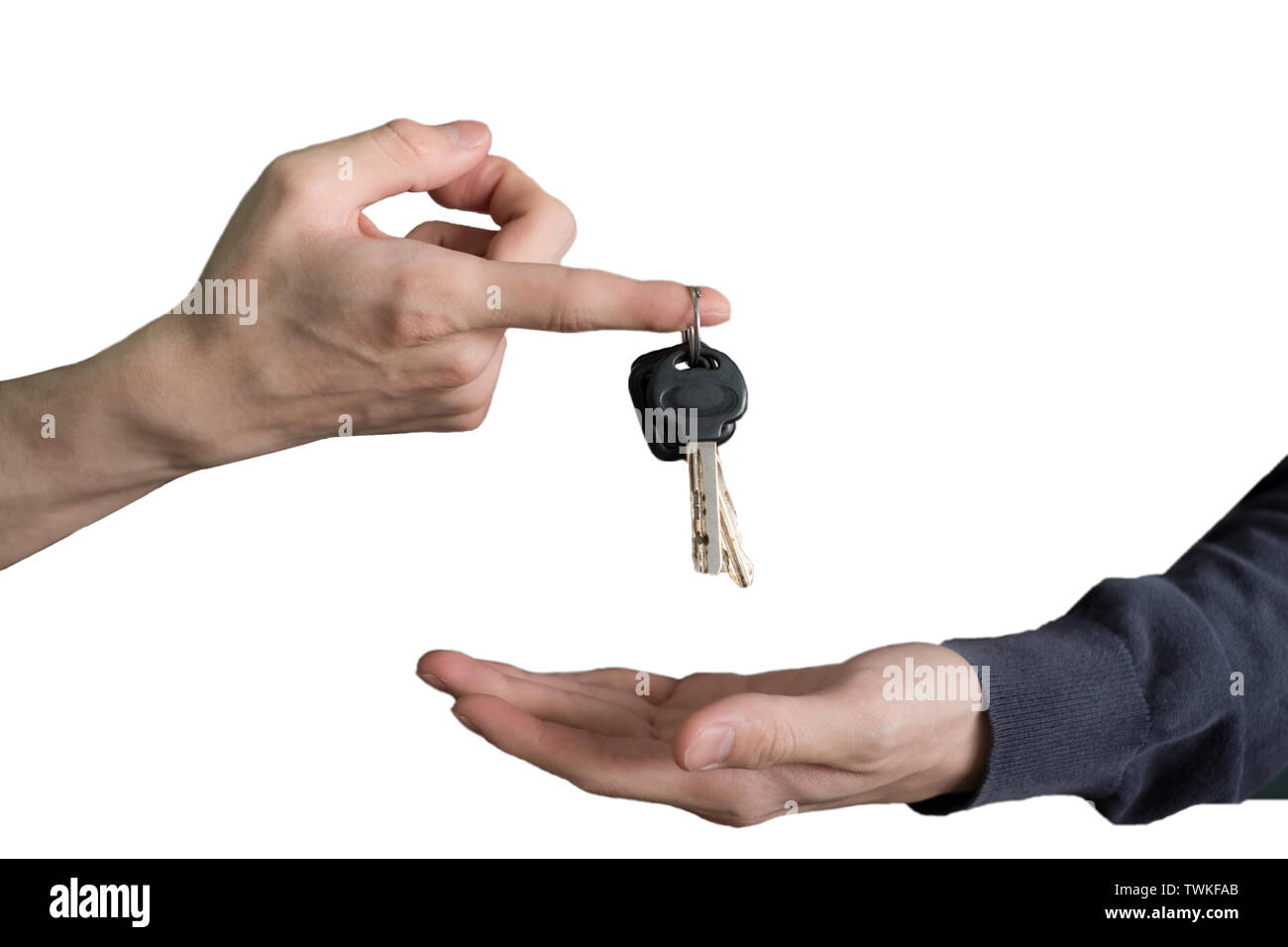 Hand handing over car keys with finger and hand receiving on white ...