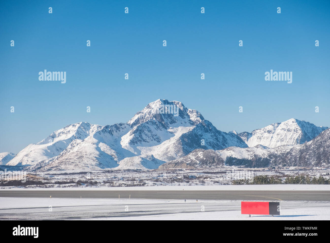 Landscape of snowy mountain range on winter in runway at the airport ...