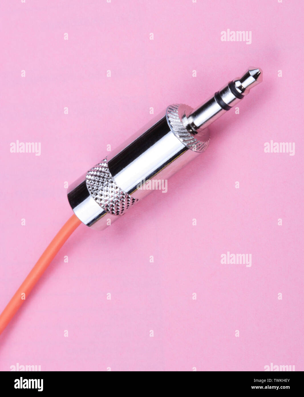 Stereo Male Plug Connector on Pink Background Stock Photo - Alamy