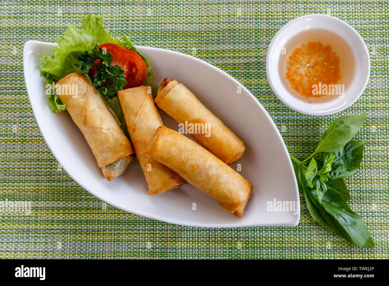 Vietnamese fried spring rolls served with dipping sauce. Top view Stock ...