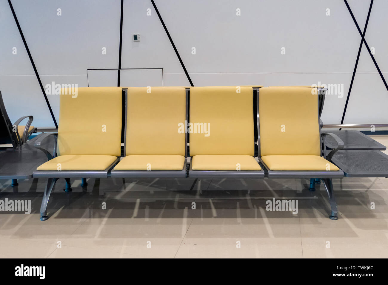 Rows of seat in modern airport lounge Stock Photo - Alamy