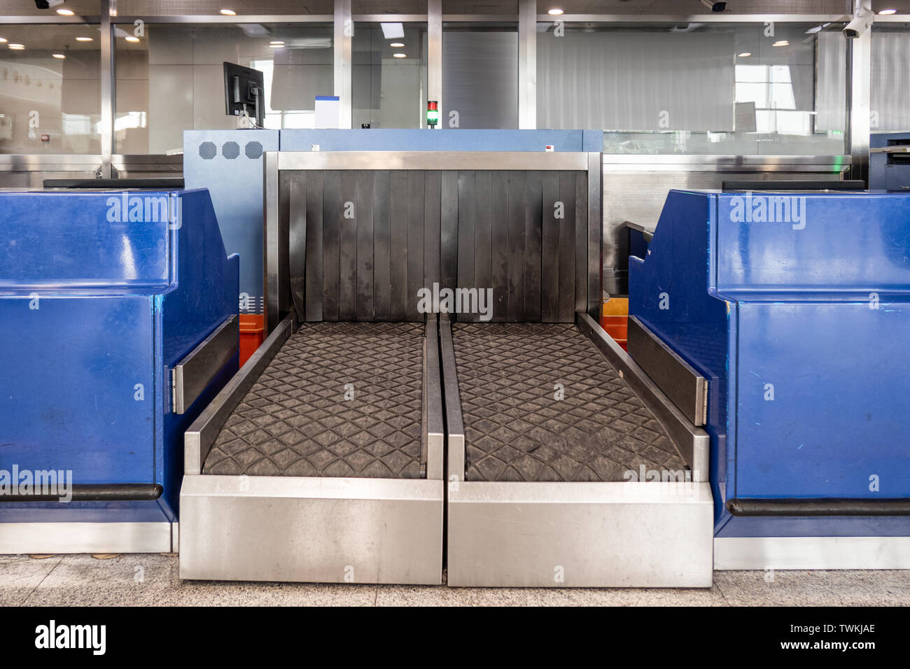 Luggage x-ray scanner conveyor belt of security at immigration ...