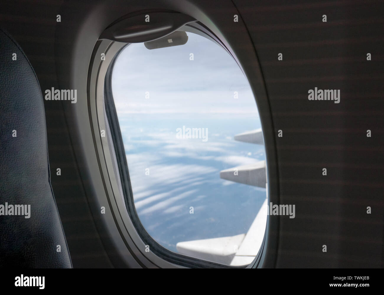 Window side of passenger with wing airplane flying on sky Stock Photo ...