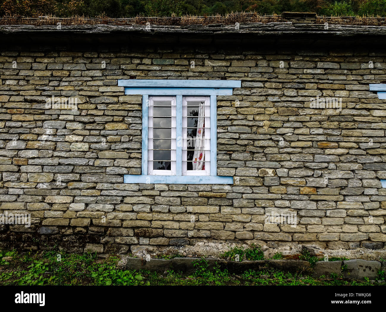 Wooden window with brick wall of rural house in Pokhara, Nepal Stock ...