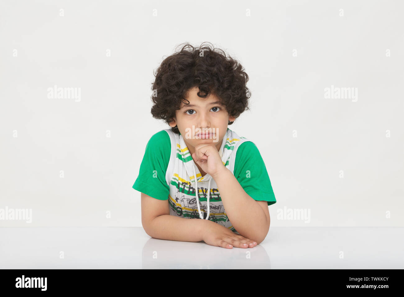 Portrait of a boy lying down Stock Photo - Alamy