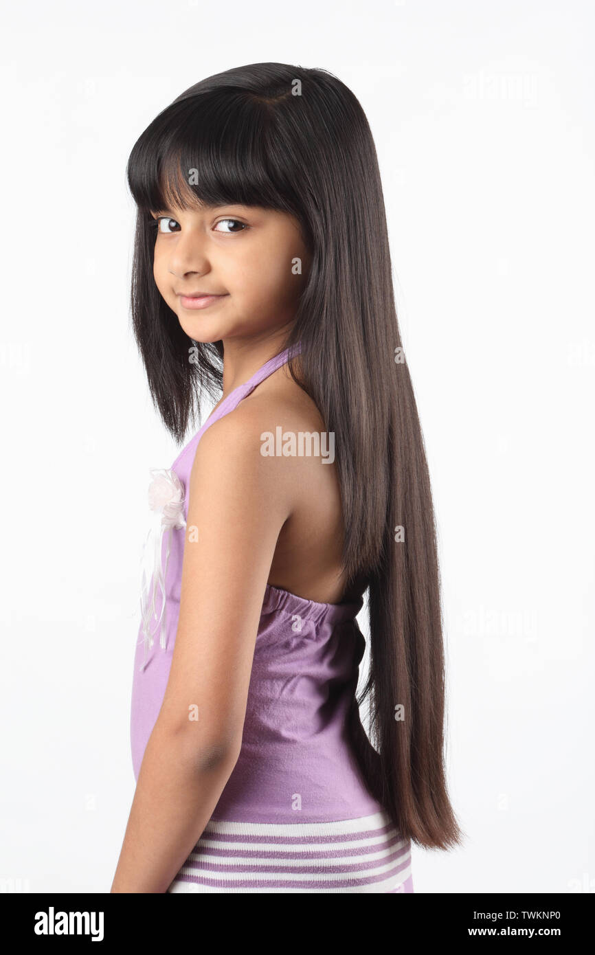 Portrait of a girl showing straight hair Stock Photo - Alamy
