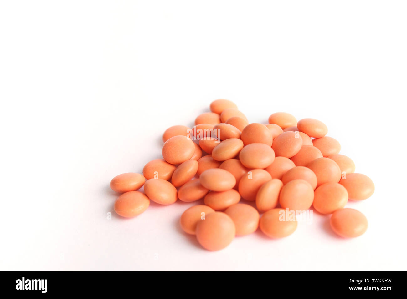 orange tablets on white background. copyspace for text. Epidemic ...