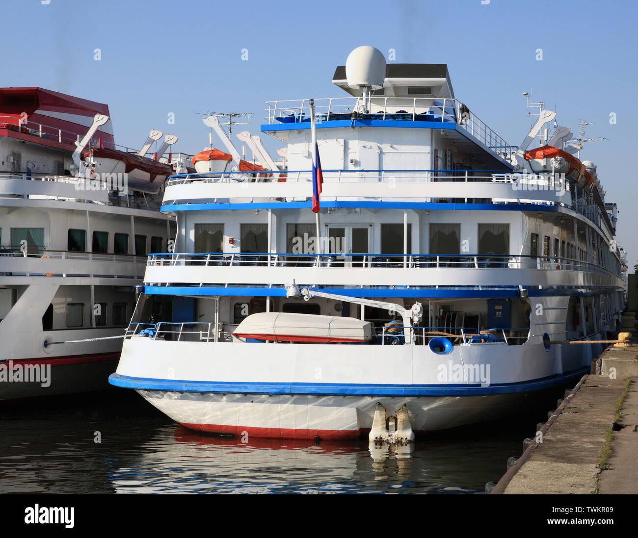 three-dec ship by berth at day to be anchored Stock Photo - Alamy