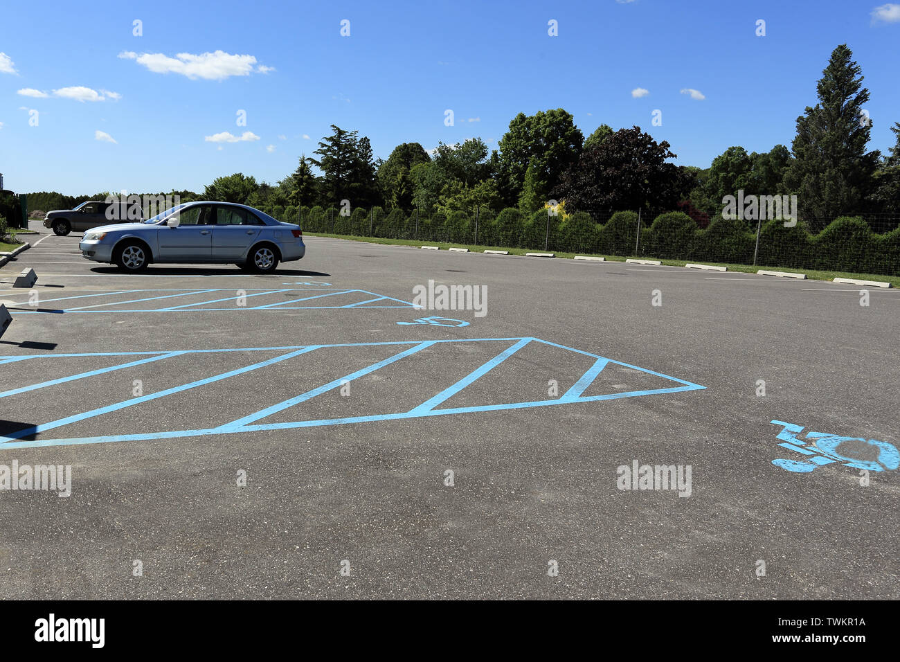 Handicap parking spaces Stock Photo - Alamy