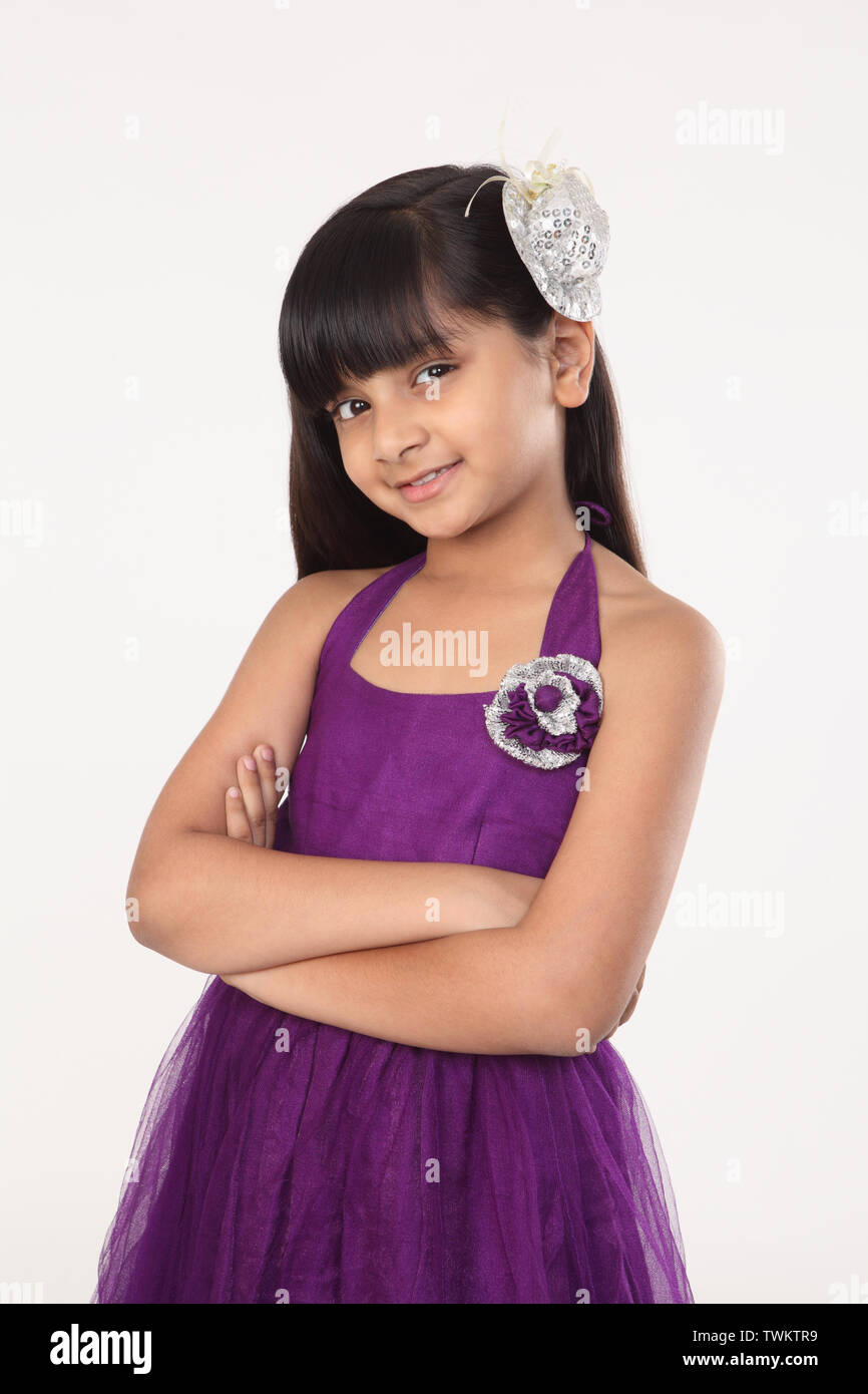 Portrait of a girl with arms crossed Stock Photo - Alamy