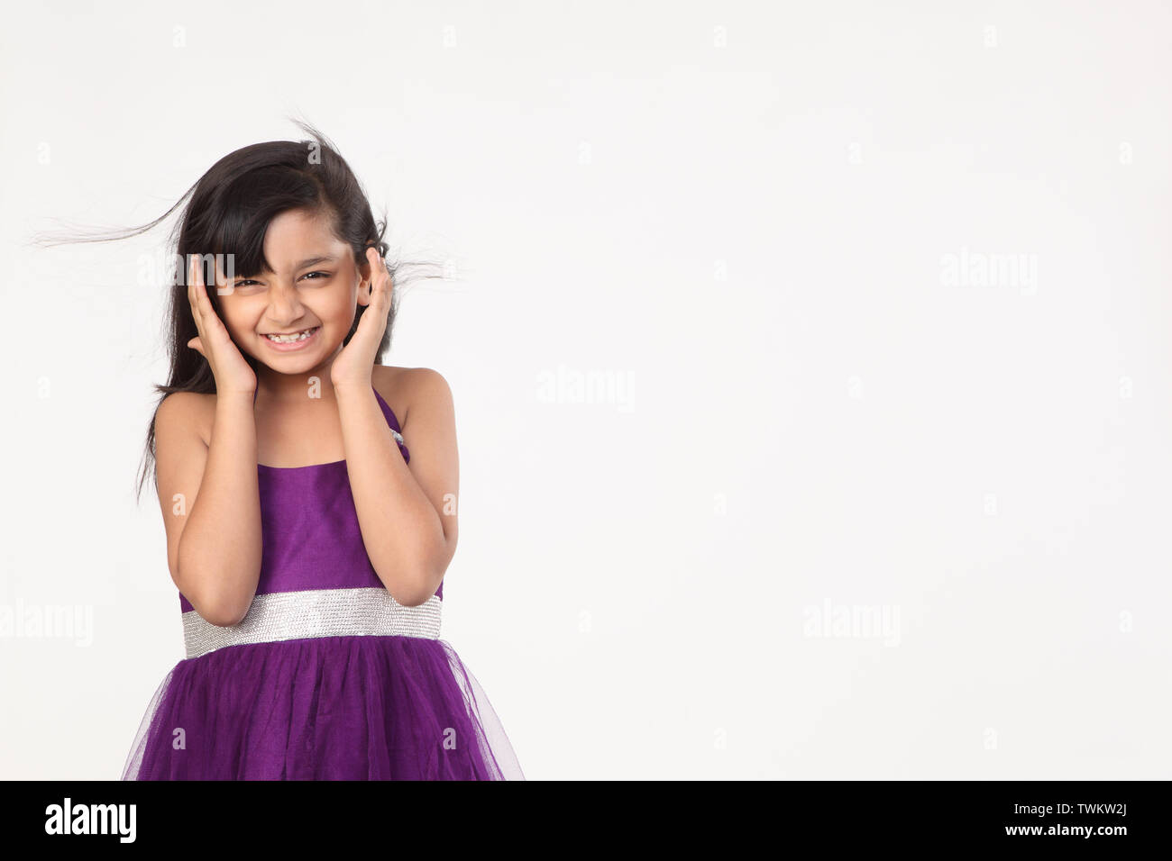 Girl 5 covering ears hi-res stock photography and images - Alamy