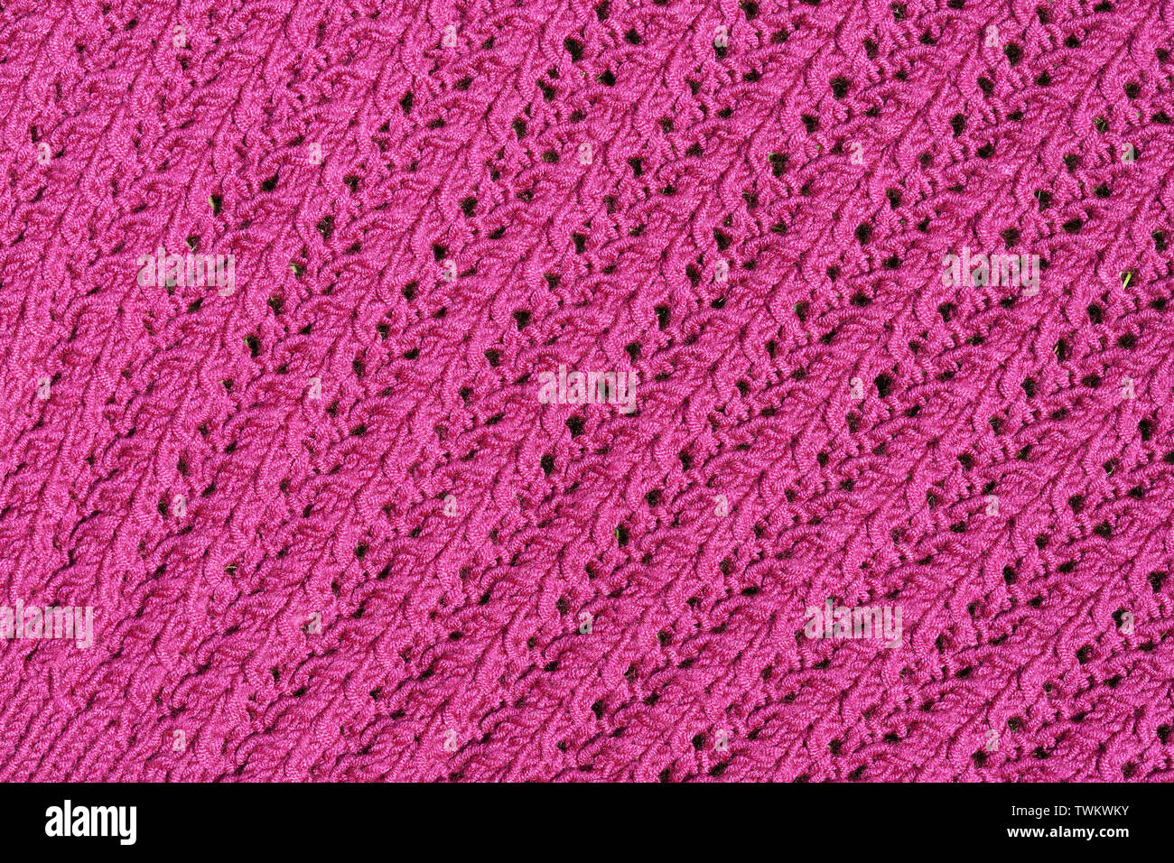 Abstract textured background of close up detail of a hand knitted ...