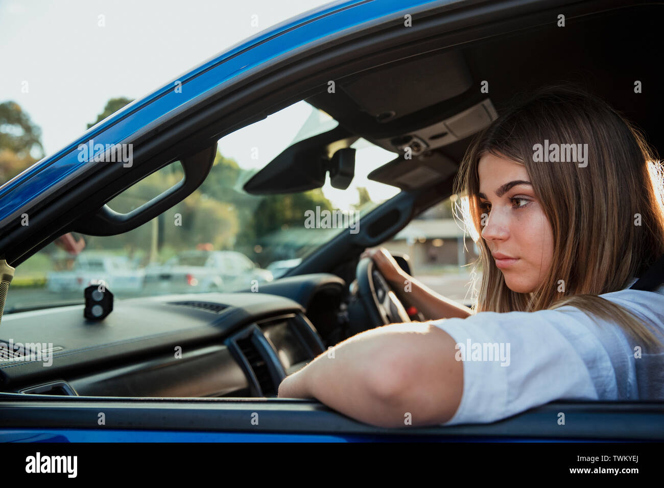 Young girl going for a drive with her mother Stock Photo - Alamy