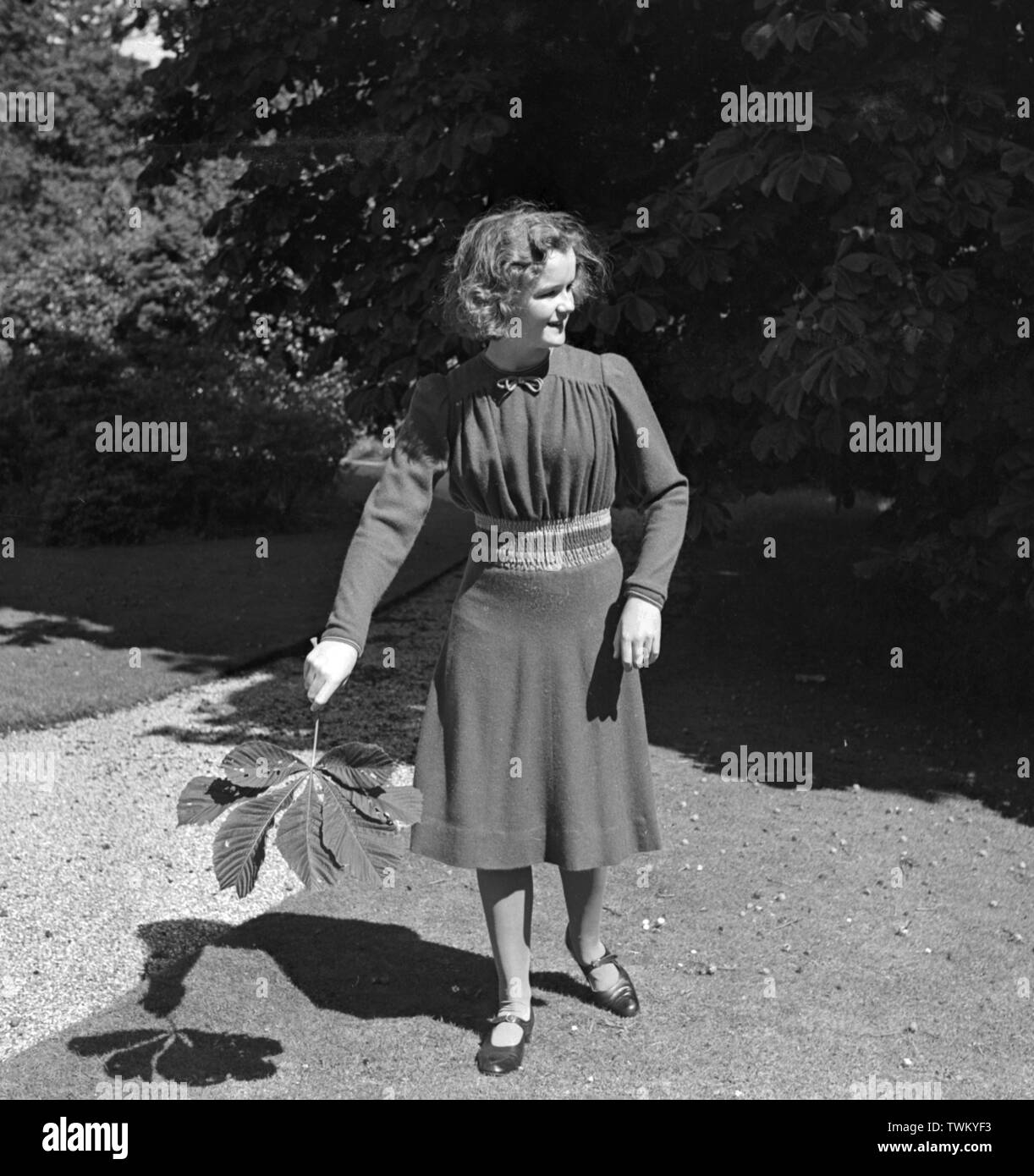 Two girls posing on a croquet lawn c1948. Photo by Gilbert Adams From ...