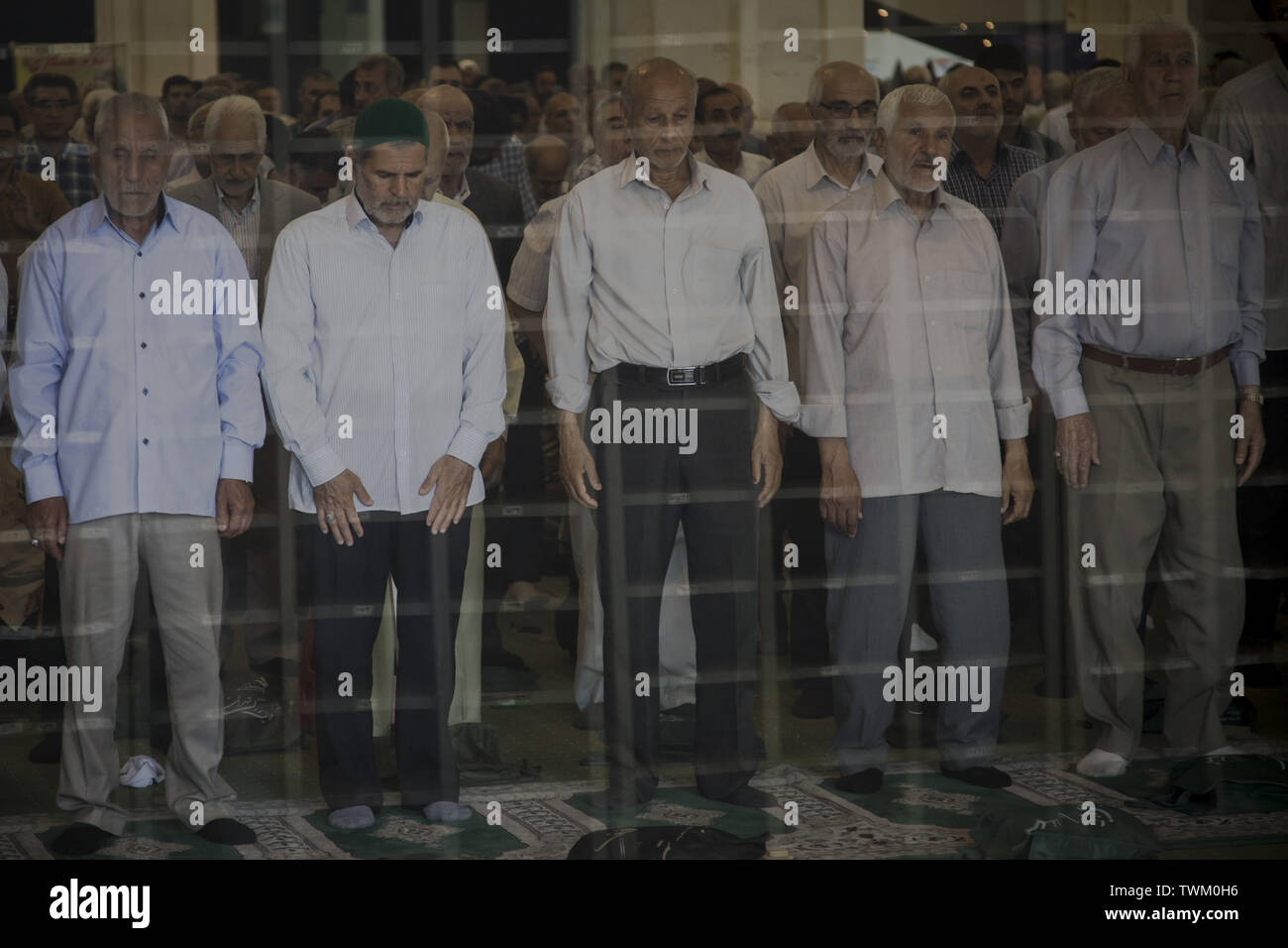 Tehran, Tehran, Iran. 21st June, 2019. Iranian worshippers perform ...