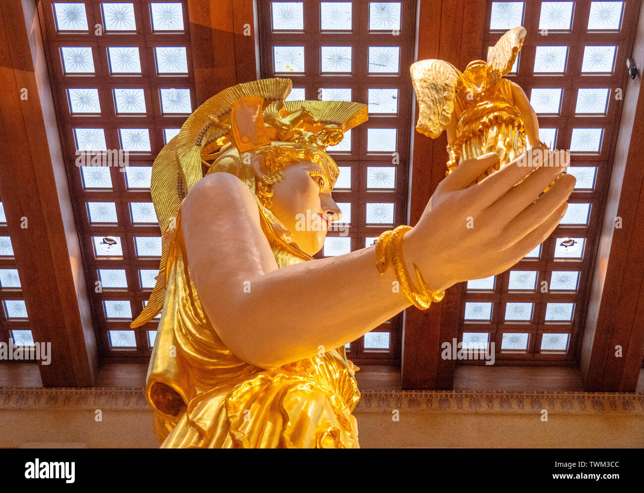 Full scale replica of Athena Parthenos statue holding statue of goddess Nike inside Parthenon in ...