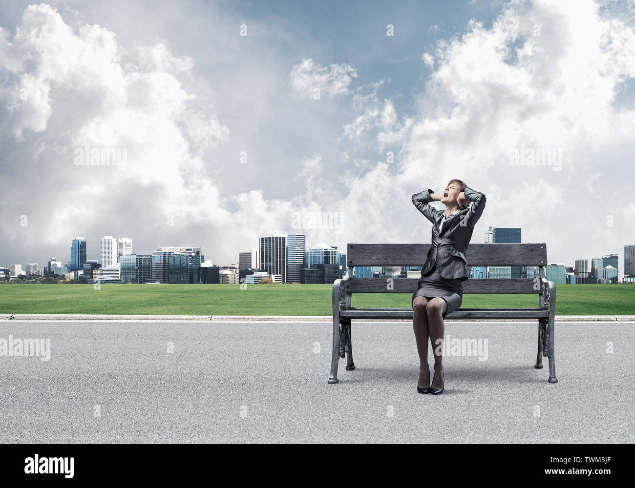 Stressful woman sitting on wooden bench. Emotional screaming girl keeps ...