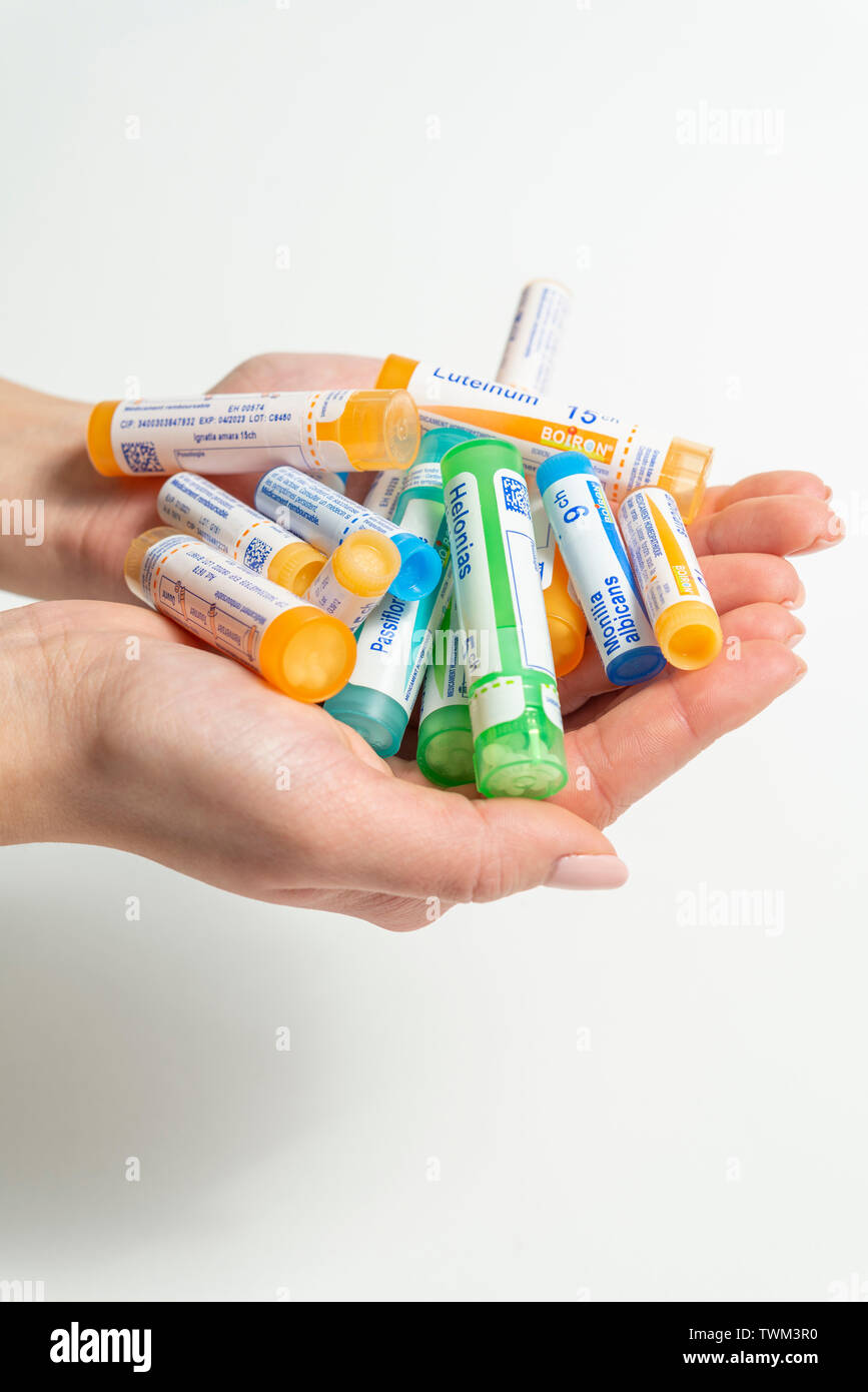 Woman holding tubes hi-res stock photography and images - Alamy