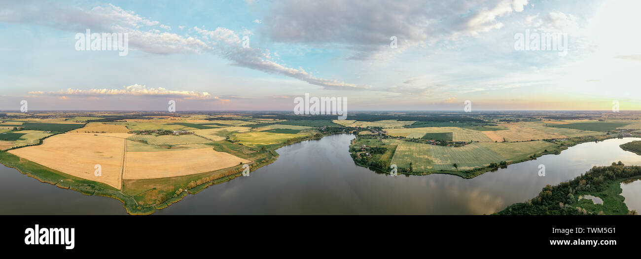 Panoramic view of a sunset sky over the lake Stock Photo - Alamy