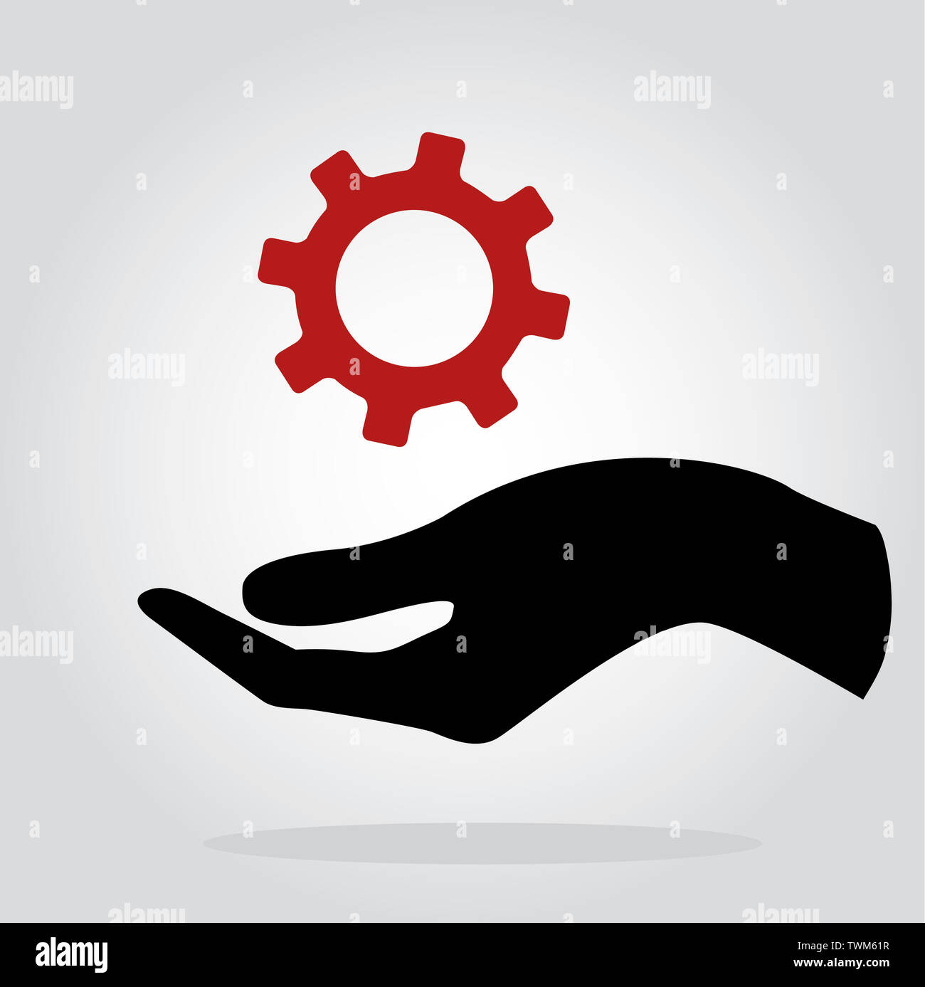 hand holding gear , engineer symbol Stock Photo - Alamy