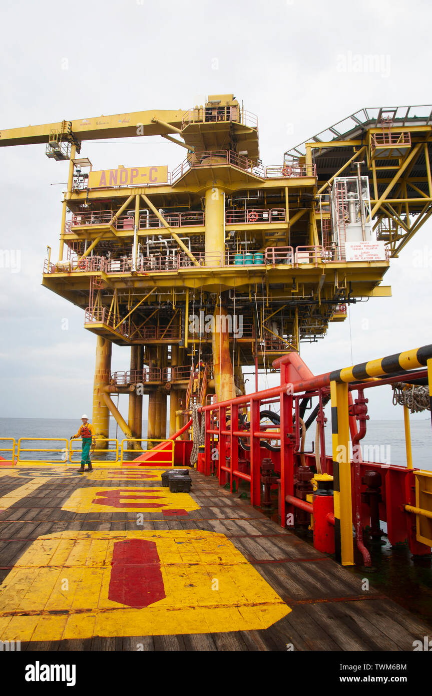 offshore worker working on deck for loading cargo Stock Photo - Alamy