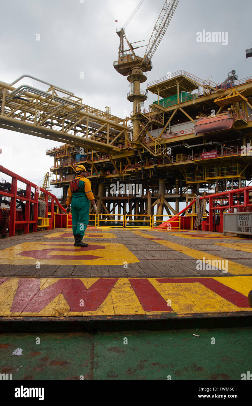offshore worker working on deck for loading cargo Stock Photo - Alamy