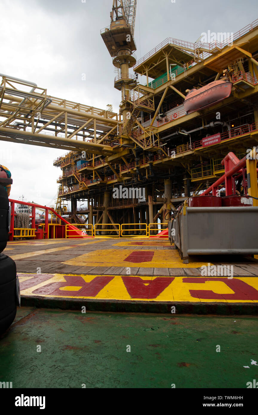 offshore worker working on deck for loading cargo Stock Photo - Alamy