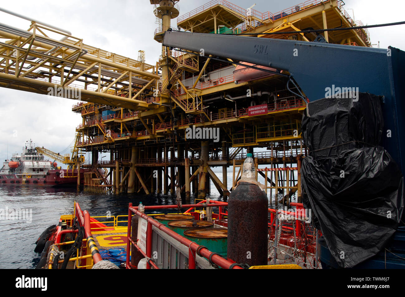 offshore worker working on deck for loading cargo Stock Photo - Alamy