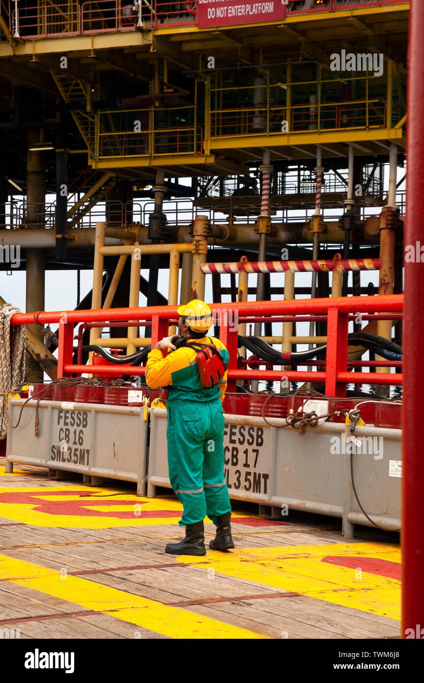 offshore worker working on deck for loading cargo Stock Photo - Alamy