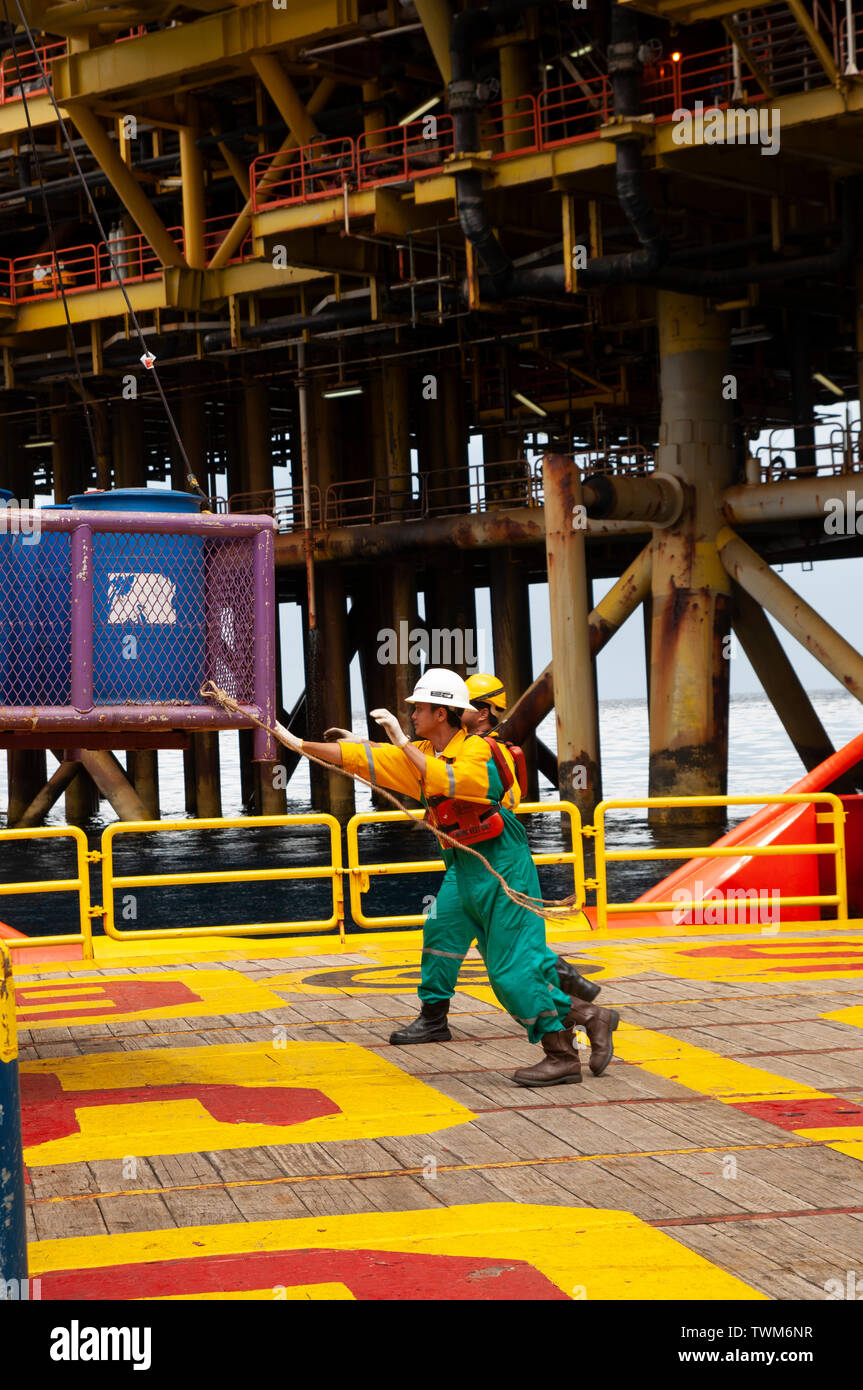 offshore worker working on deck for loading cargo Stock Photo - Alamy